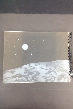 The Moon Through the Microscope: A Selection of Lunar Micrographs